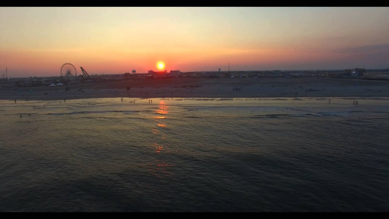 Cruising the beach during sunset 4K - YouTube