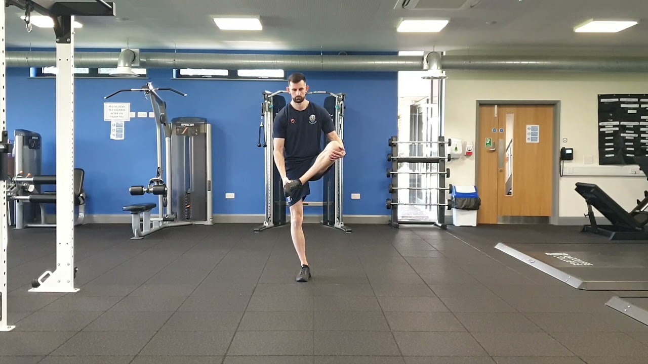 Standing Knee + Ankle Hug - YouTube