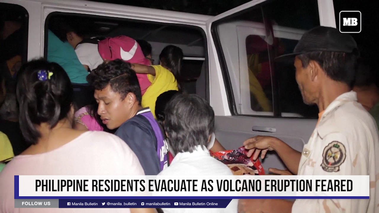 Philippine residents evacuate as volcano eruption feared - YouTube