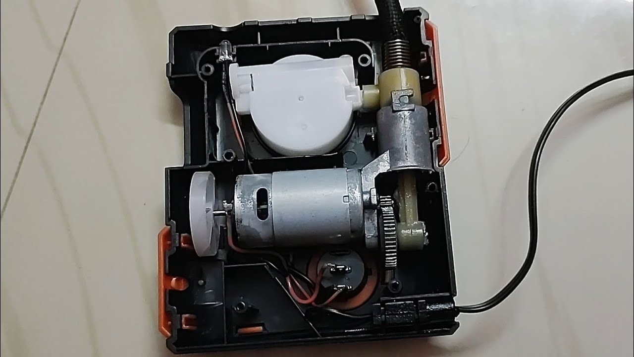 Inside a portable air compressor - YouTube