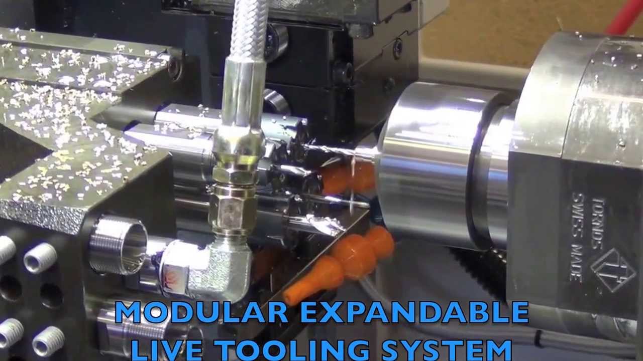 Tornos model ST-26 9-axis CNC Swiss screw machine - YouTube