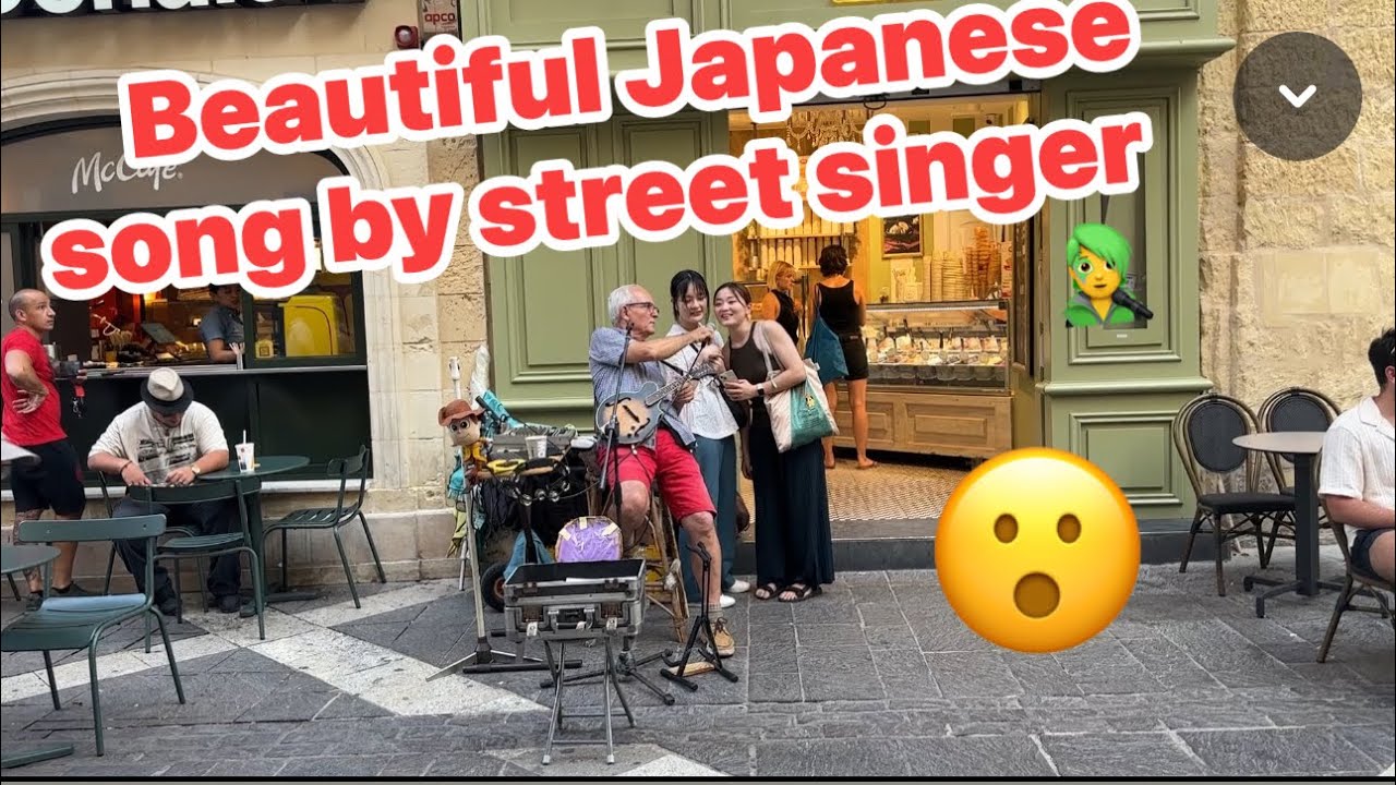 Beautiful Japanese songs by street singer with 2 Japanese lady - YouTube