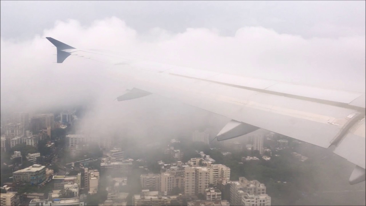 GO AIRLINES AIRBUS 320 awesome landing in stormy rainy weather - YouTube