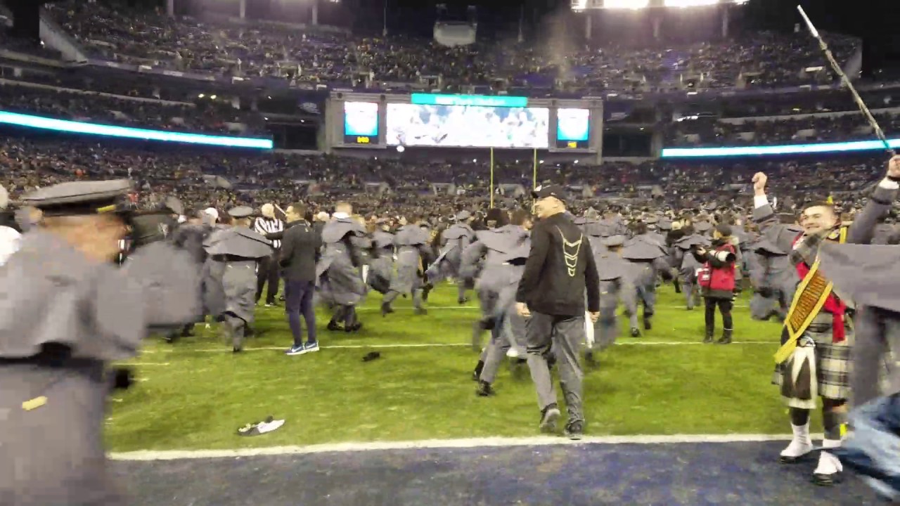 Army cadets rush field after victory over Navy - YouTube