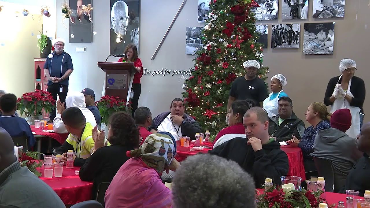 Camillus House serves up holidays meals for homeless - YouTube