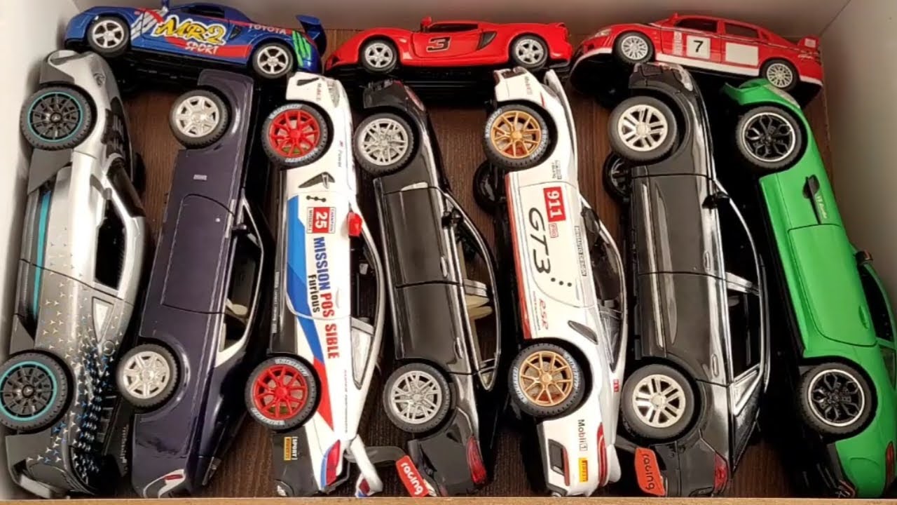 Box full off model cars,Porsche Gt,toyota sport,Rolls royse,Lotus ...