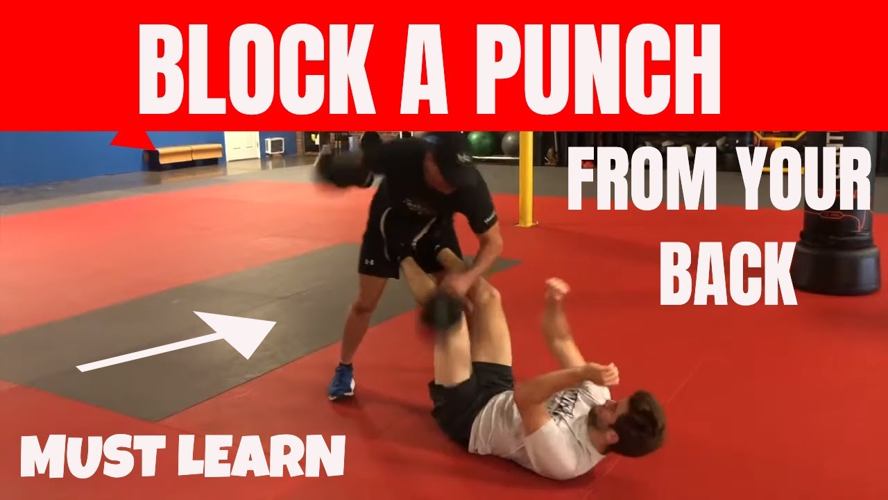 How to block a punch on the ground - YouTube