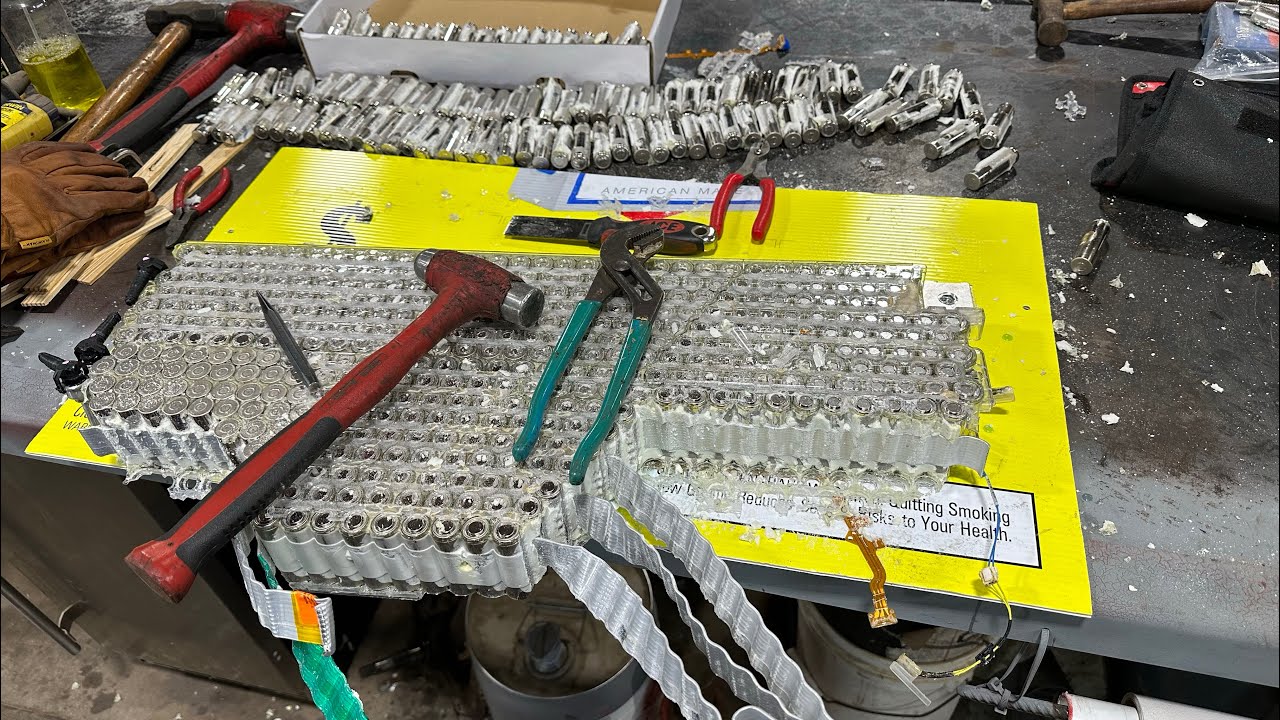 Part 1 Tesla battery disassembly - YouTube