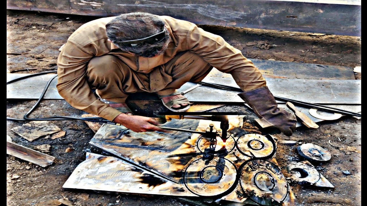 "Precision Craftsmanship: Hand-Cutting Steel Plates with Skill and ...