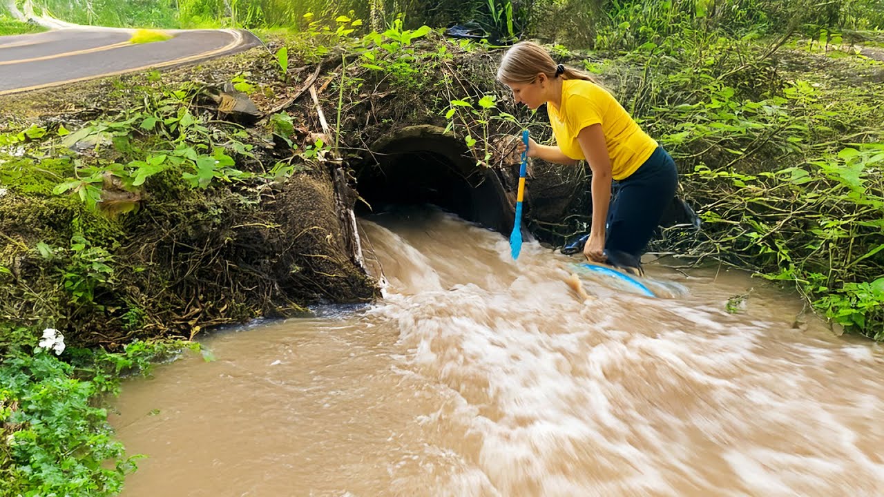Restoring the Flow Clearing Trash from Clogged Culverts - YouTube