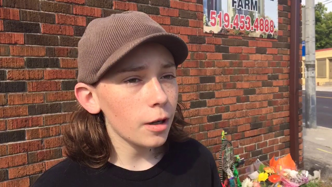Teen tends to tribute to fallen biker - YouTube