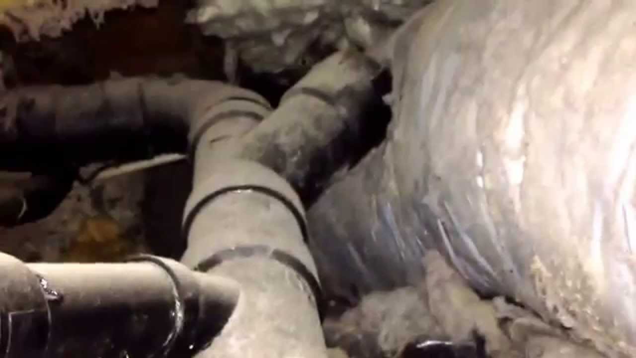 Plumbing connection in crawlspace - YouTube