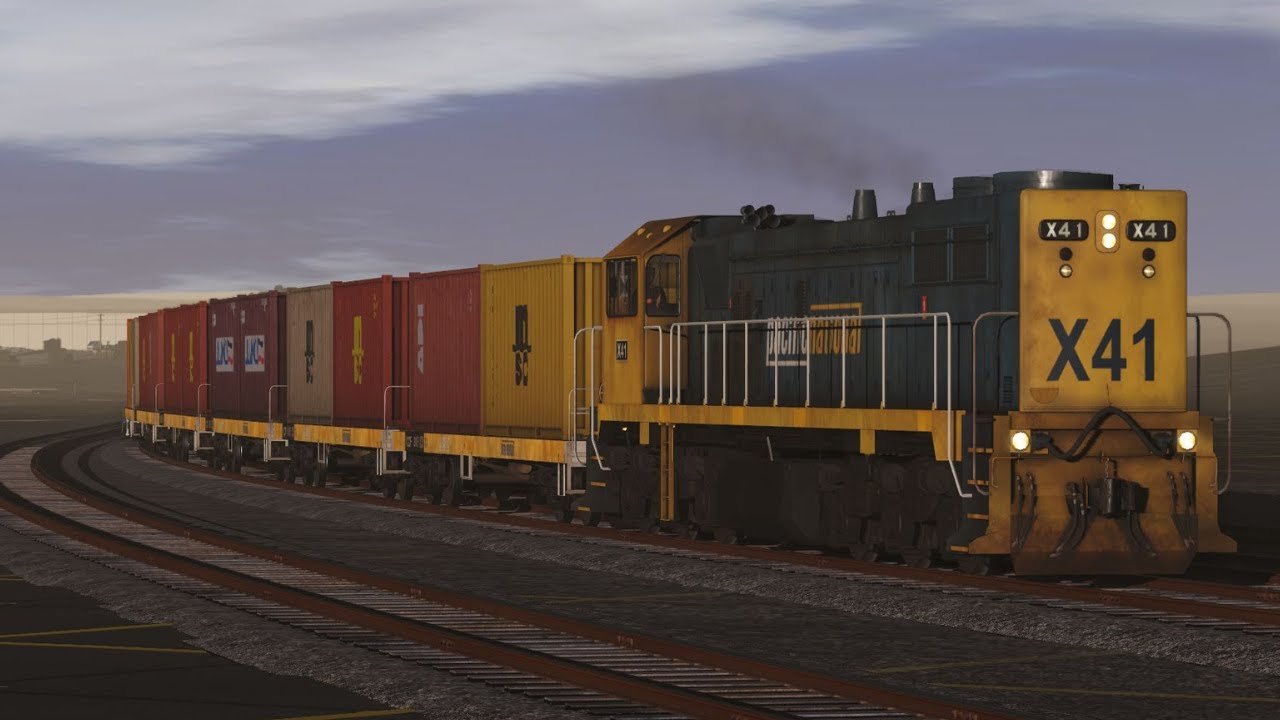 Rare Day light up Warrnambool freight hauled by X41 passing North Shore ...