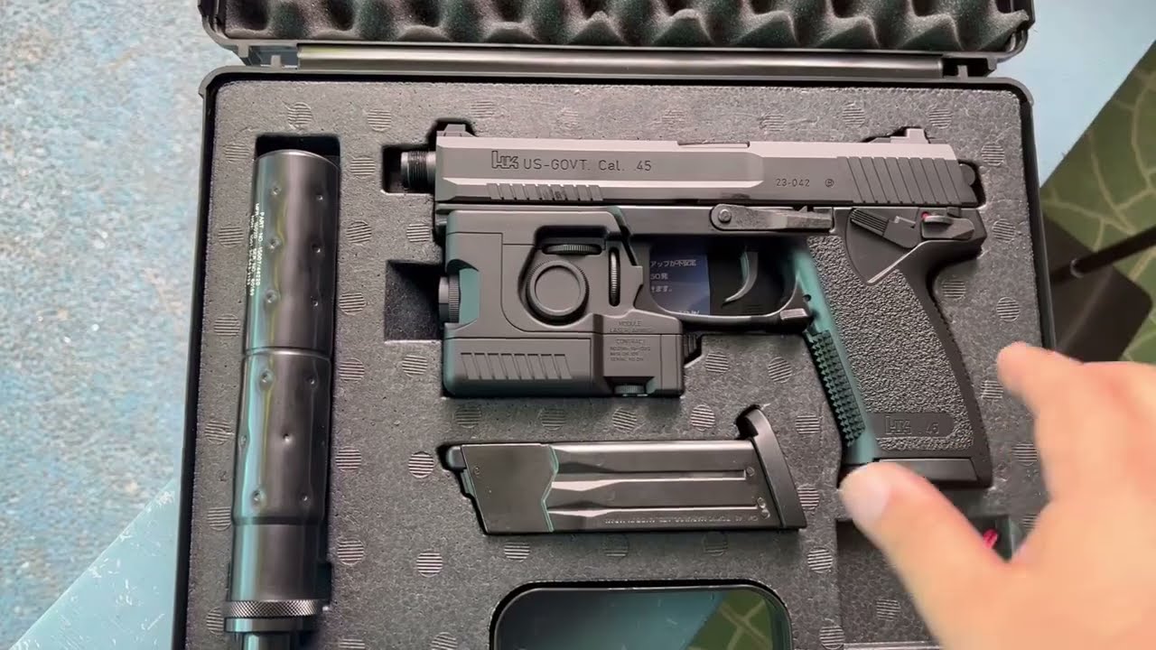 Does the Tokyo Marui TM Mk23 Suppressor / Silencer really work? - YouTube