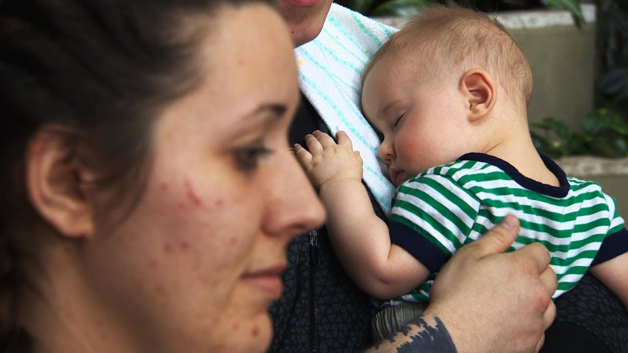 Mom jumps with baby from 2nd storey to escape fire - YouTube