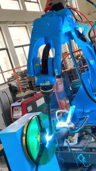 The welding robotic arm efficiently performs precise welding tasks ...