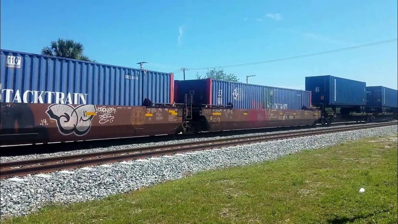 FEC 202 through Lantana with a mixed consist - YouTube