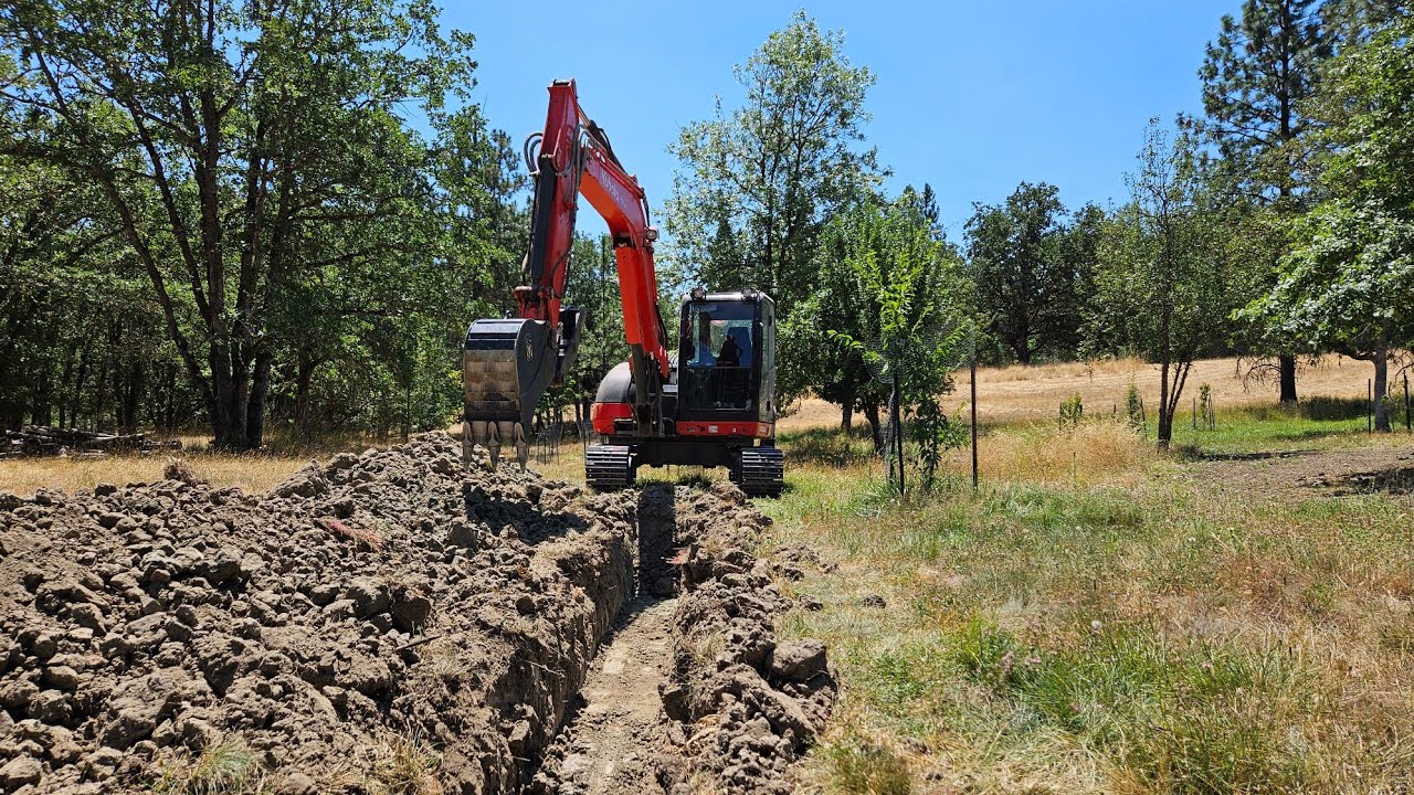 Trenching with the new Werk Brau bucket and trees Kubota KX 080 4 ...