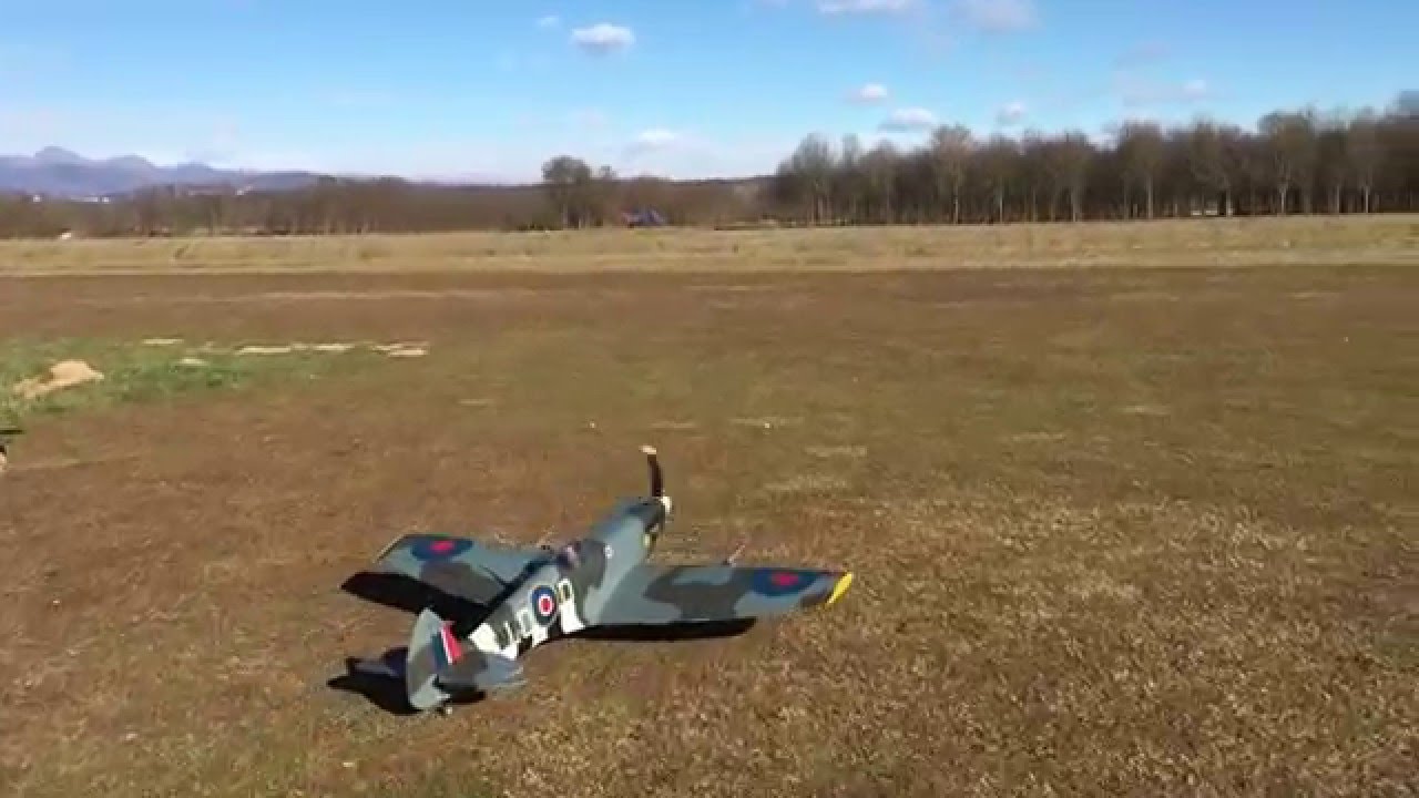 Hangar 9 Spitfire 30 cc saito 220 gas converted - YouTube