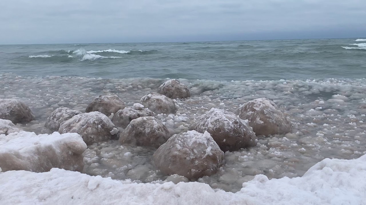 Ice Boulders Form Under Lake Michigan's Rolling Waves - YouTube