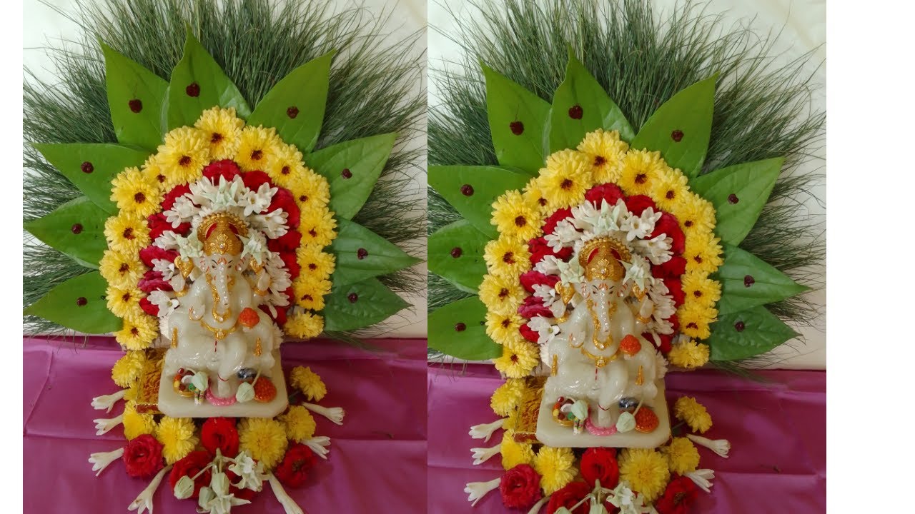Ganesha back drop decoration with flowers and dhurva(garike)for ganesha ...