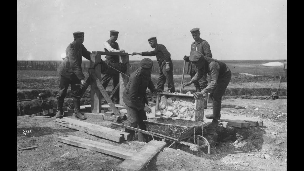 Photos of German Soldiers Building Bunkers and Barbed Wire Defenses ...
