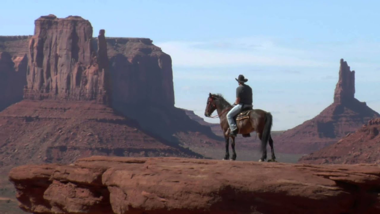 Long Shot of Cowboy and Horse in Monument Valley - YouTube