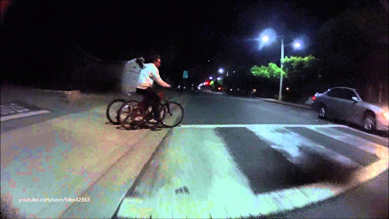 Red Light Jumping Salmon Cyclist with a Spare Bike - YouTube