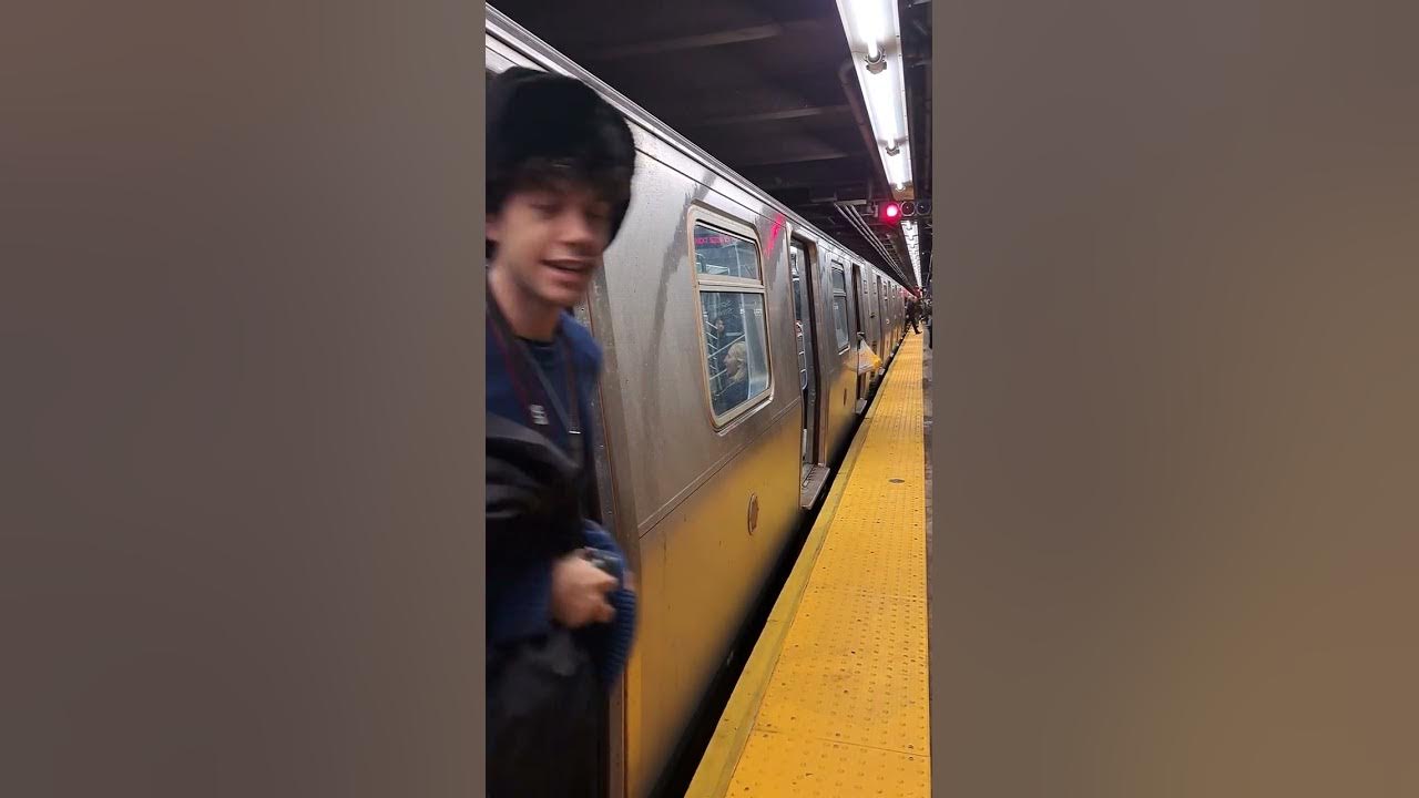 World Trade Center Bound R160A E train entering and leaving Spring Street - YouTube