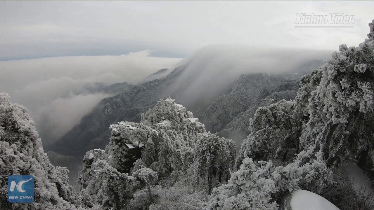Spectacular! Cloud flows down China's Mount Lu like a waterfall - YouTube