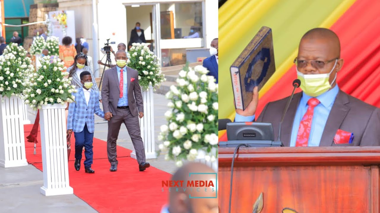 MOSES MAGOGO SWEARS IN AS A MEMEBR OF PARLIAMENT, HE IS AACOMPANIED BY ...
