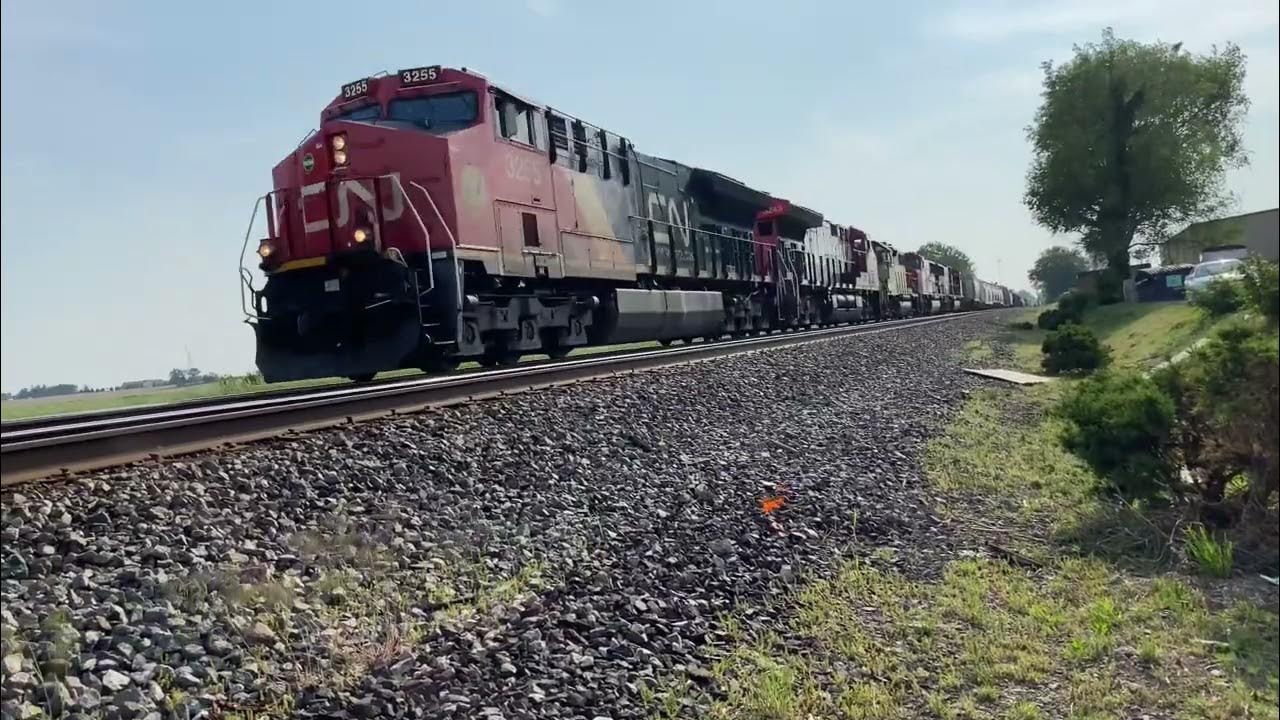 epic lash up on the CN southbend. sub with BN geep 3 out of 5 at milepost 59.1 - YouTube