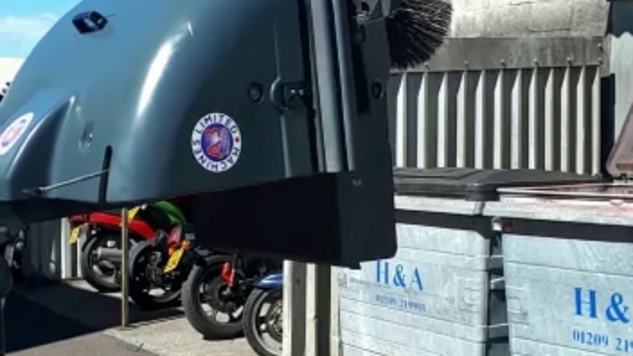 Comac CS80B ride on sweeper with hydraulic hopper Large - YouTube