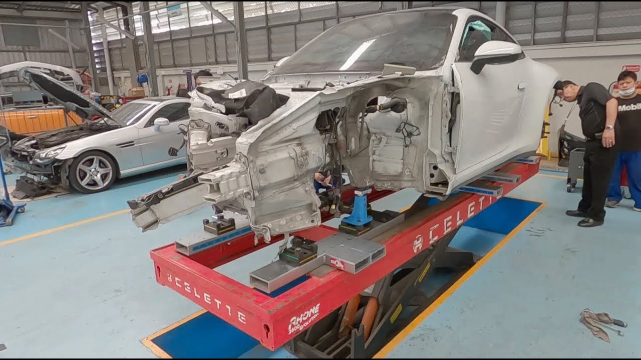 Porsche 992 full front repair on Celette inground Rhone bench and ...