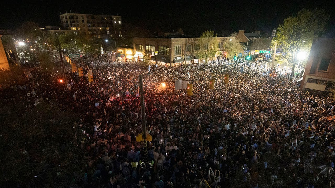 North Carolina fans rush Franklin Street after beating Duke in Final ...