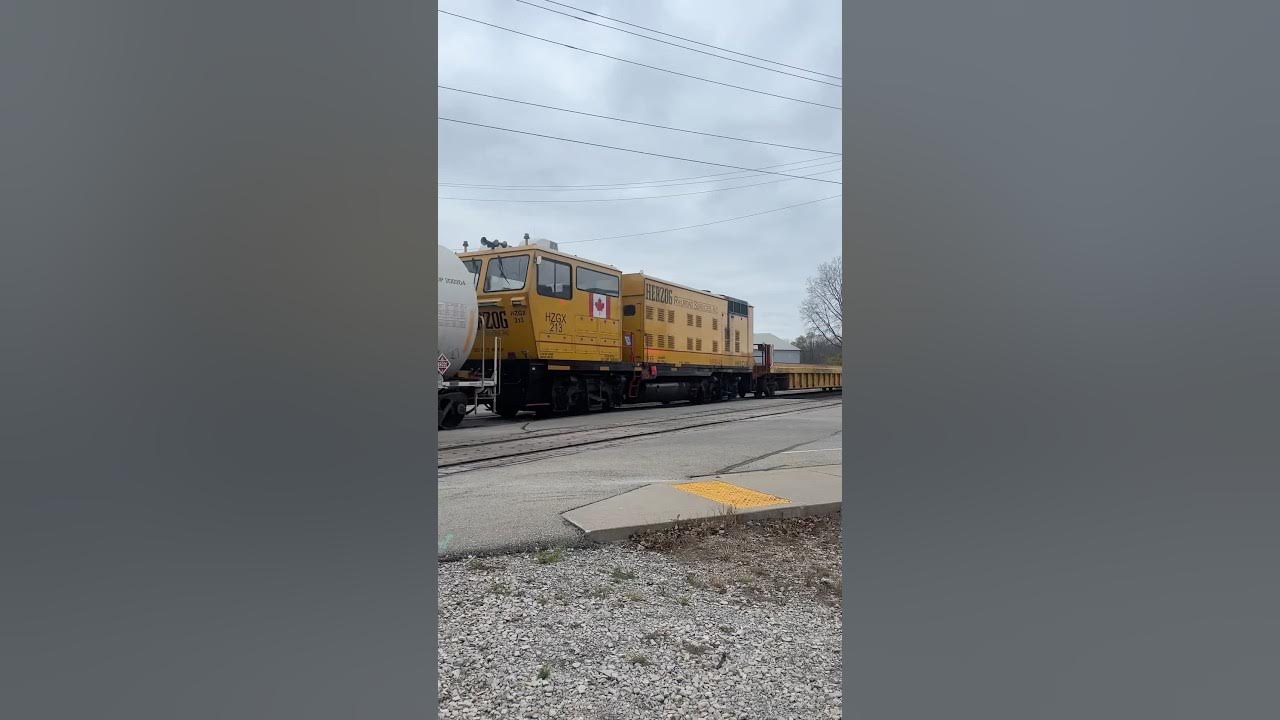 Herzog Canada set in Wisconsin! HZGX 213 and 21300 with empty well cars - YouTube