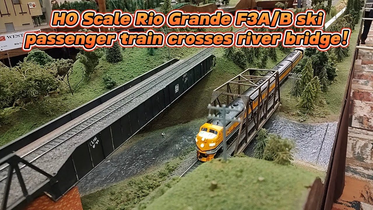 HO Scale Rio Grande F3A/B ski passenger train crosses river bridge ...