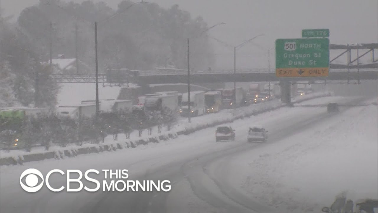 Southeast snow storm knocks out power to hundreds of thousands - YouTube