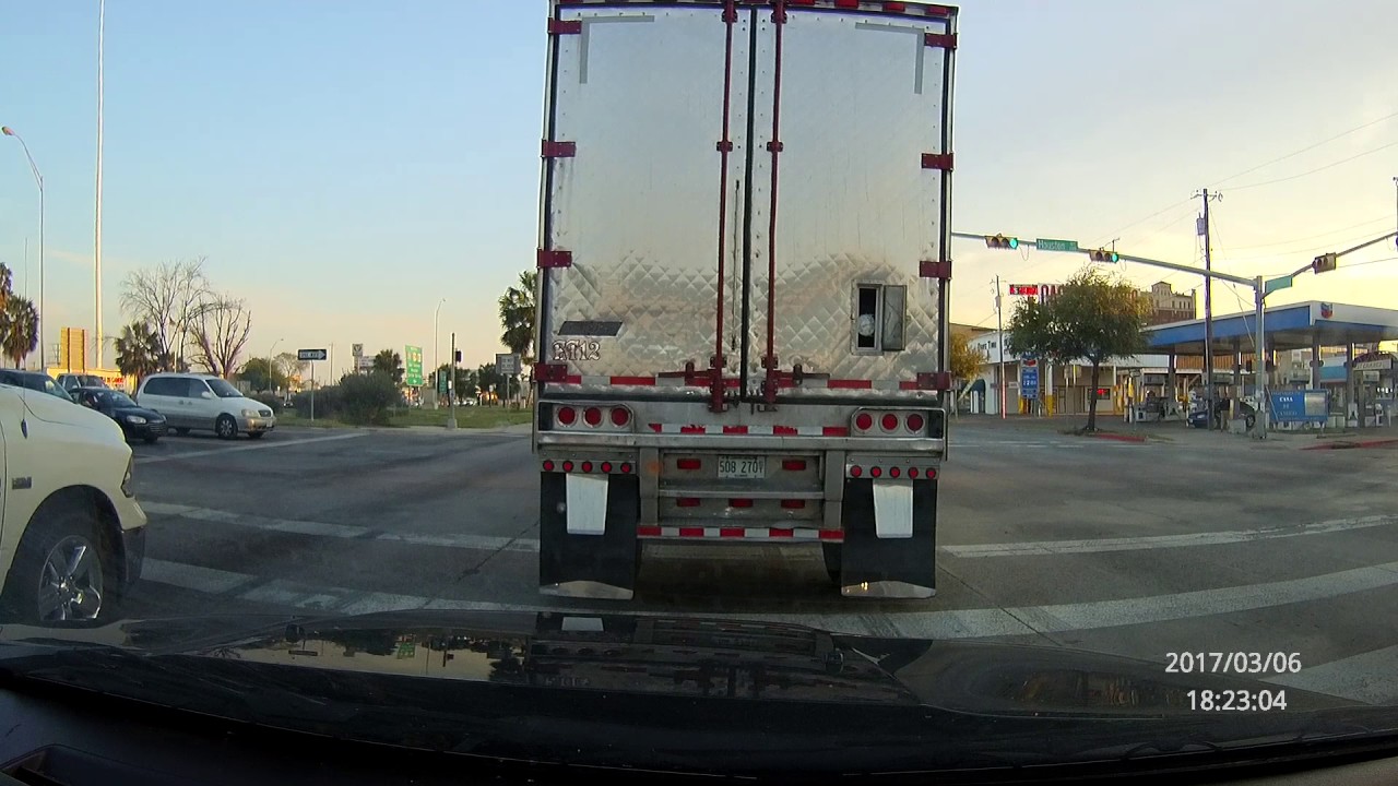Truck blocks intersection for quite a while - YouTube