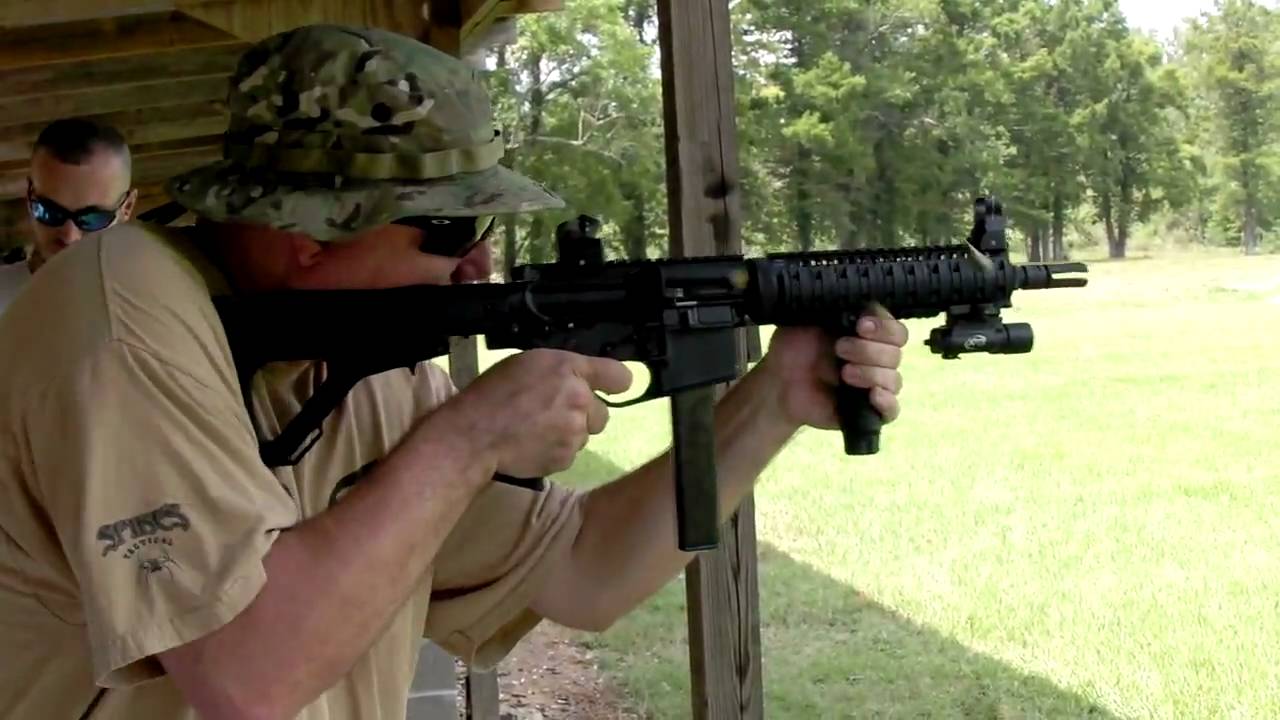 Me shooting the 9mm M16 - YouTube
