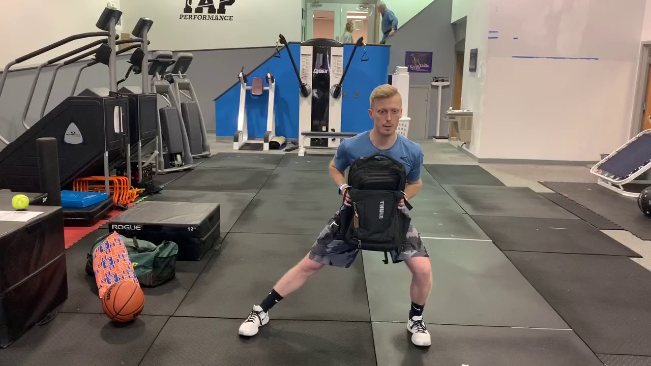 Side Squat w/Bag Press - YouTube