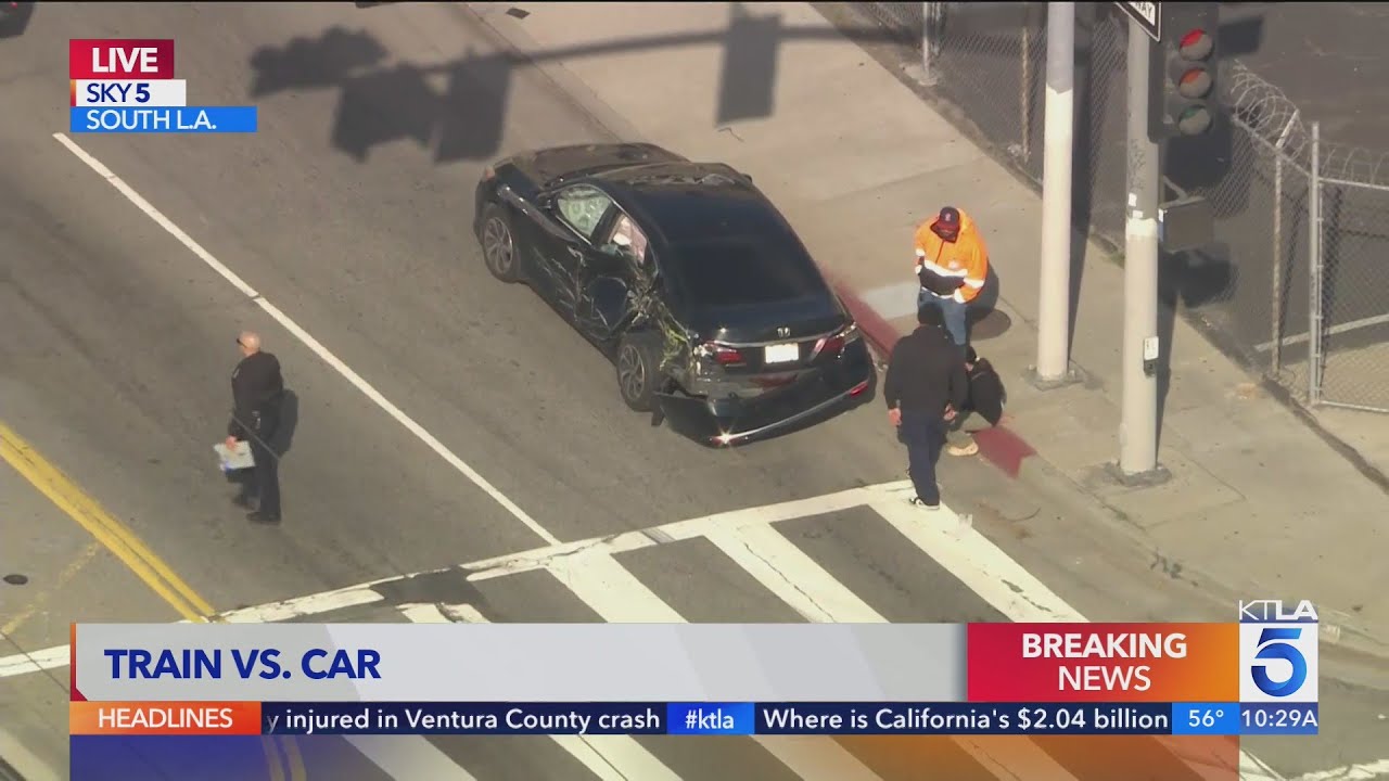 2 suffer minor injuries after crash between car and Blue Line train in ...