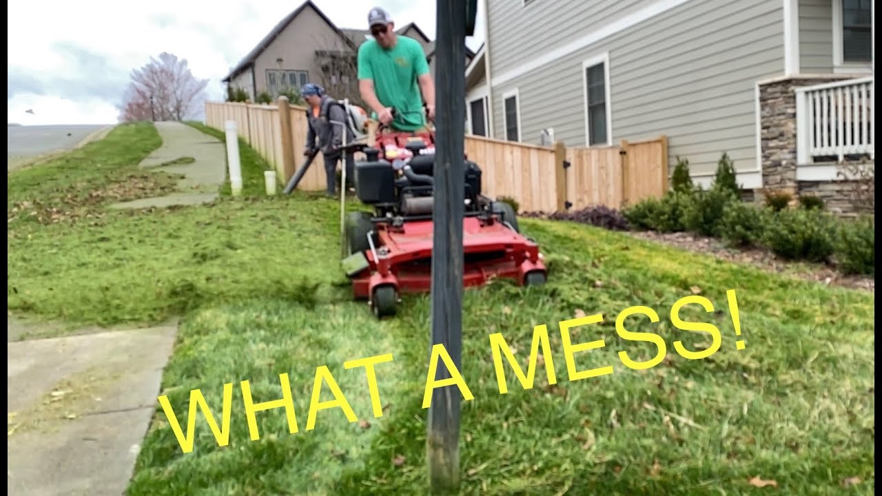 Mowing our first overgrown lawn of year! - YouTube