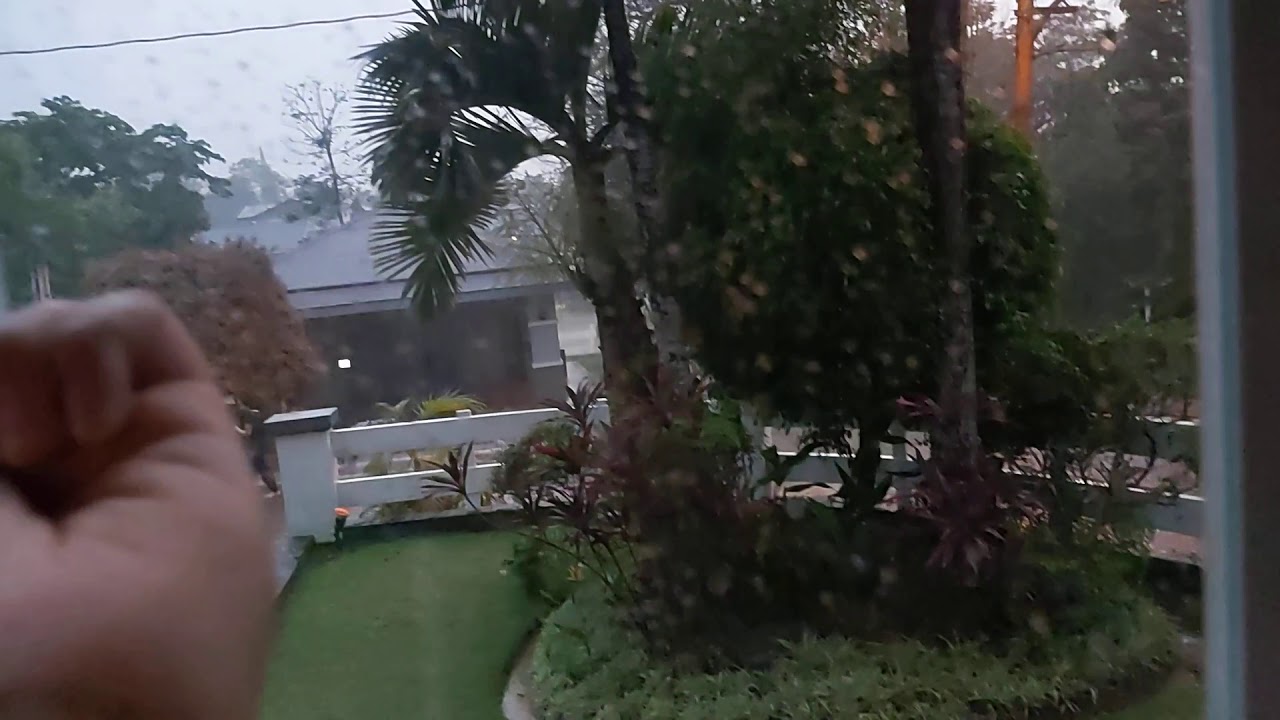 Raining hard outside... - YouTube