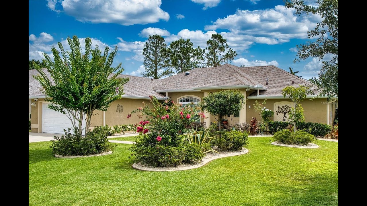 7 LEWIS SHIRE PLACE | PALM COAST Real Estate - YouTube