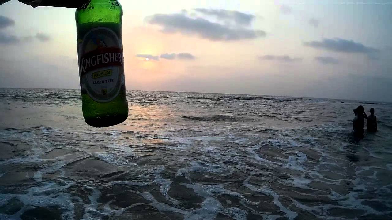 sunset swimming drinking kingfisher beer anjuna beach sunset goa india ...