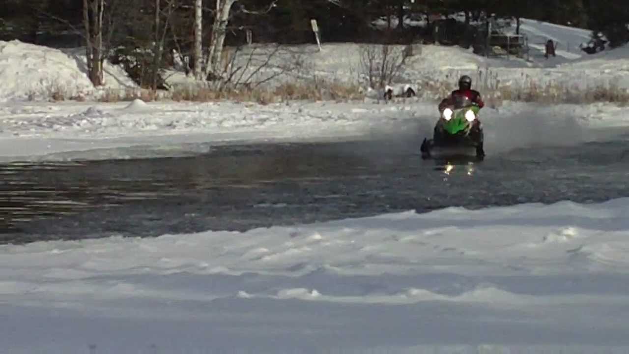 Bauers Dam water skip on 2010 Arctic Cat f8 snowmobile - YouTube