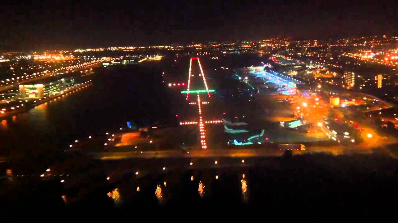 London city approach at night. - YouTube