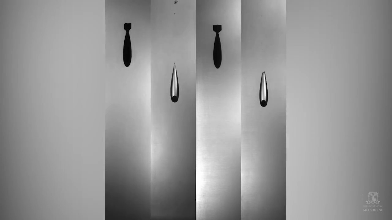 Sinking a ball in water with almost zero drag - YouTube