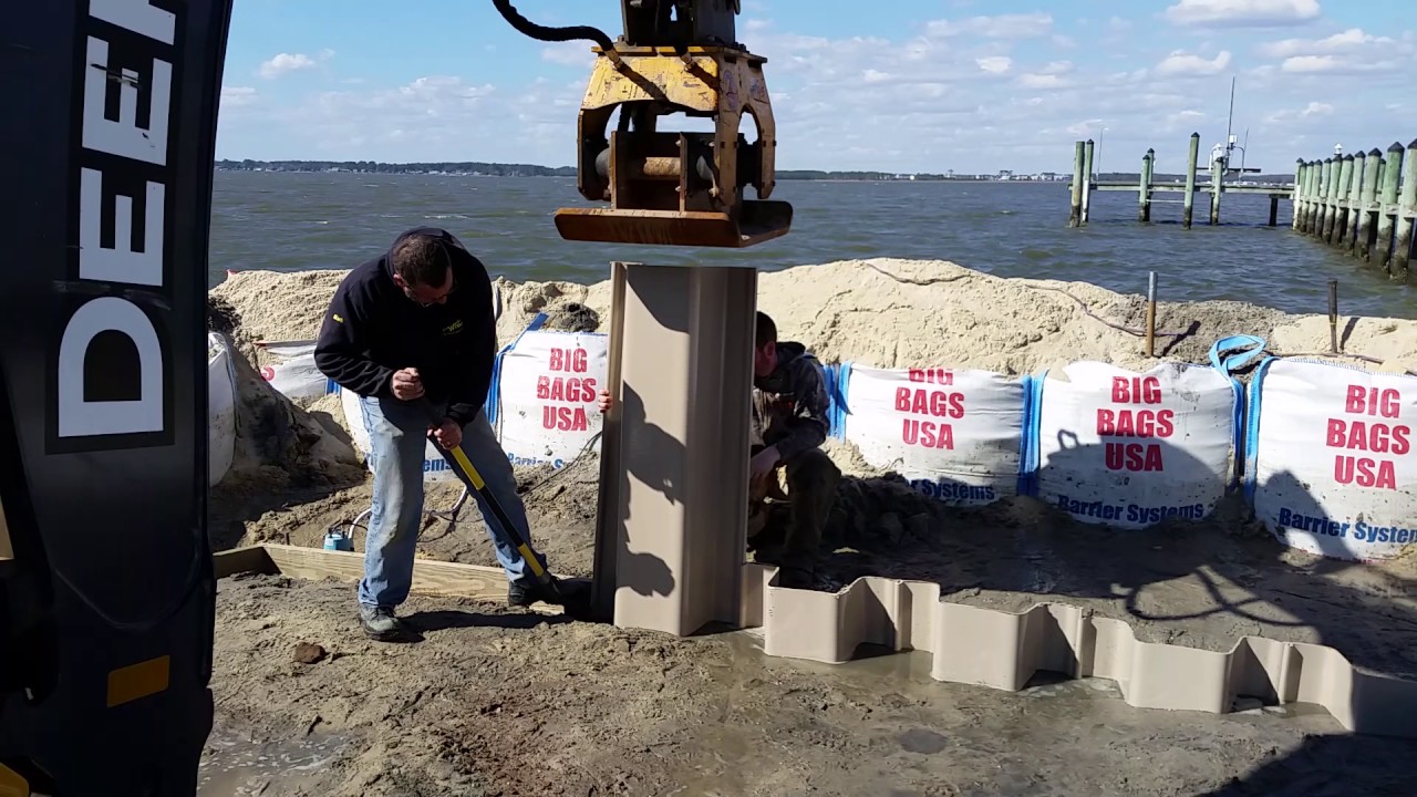Driving Vinyl Sheet Piling on Indian River Bay - YouTube